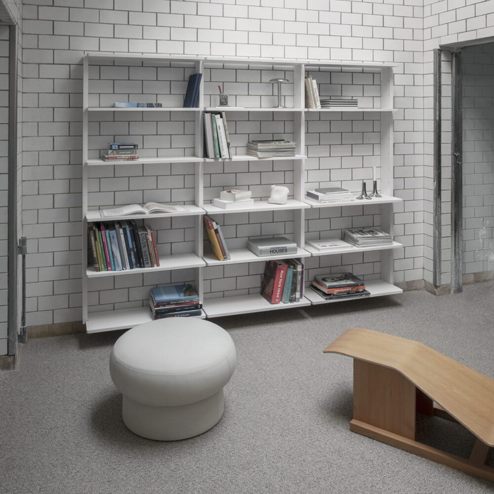Gridlock a wall-mounted shelving system design by Chris Martin ...